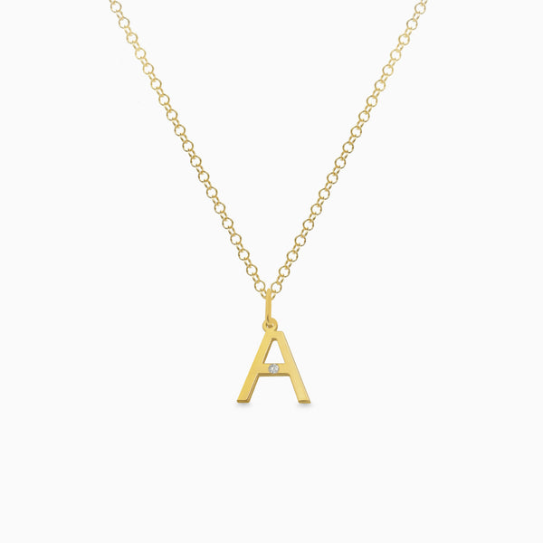 Dije en oro amarillo de 18K letra A moderna con brillante - Aldo & Co.
